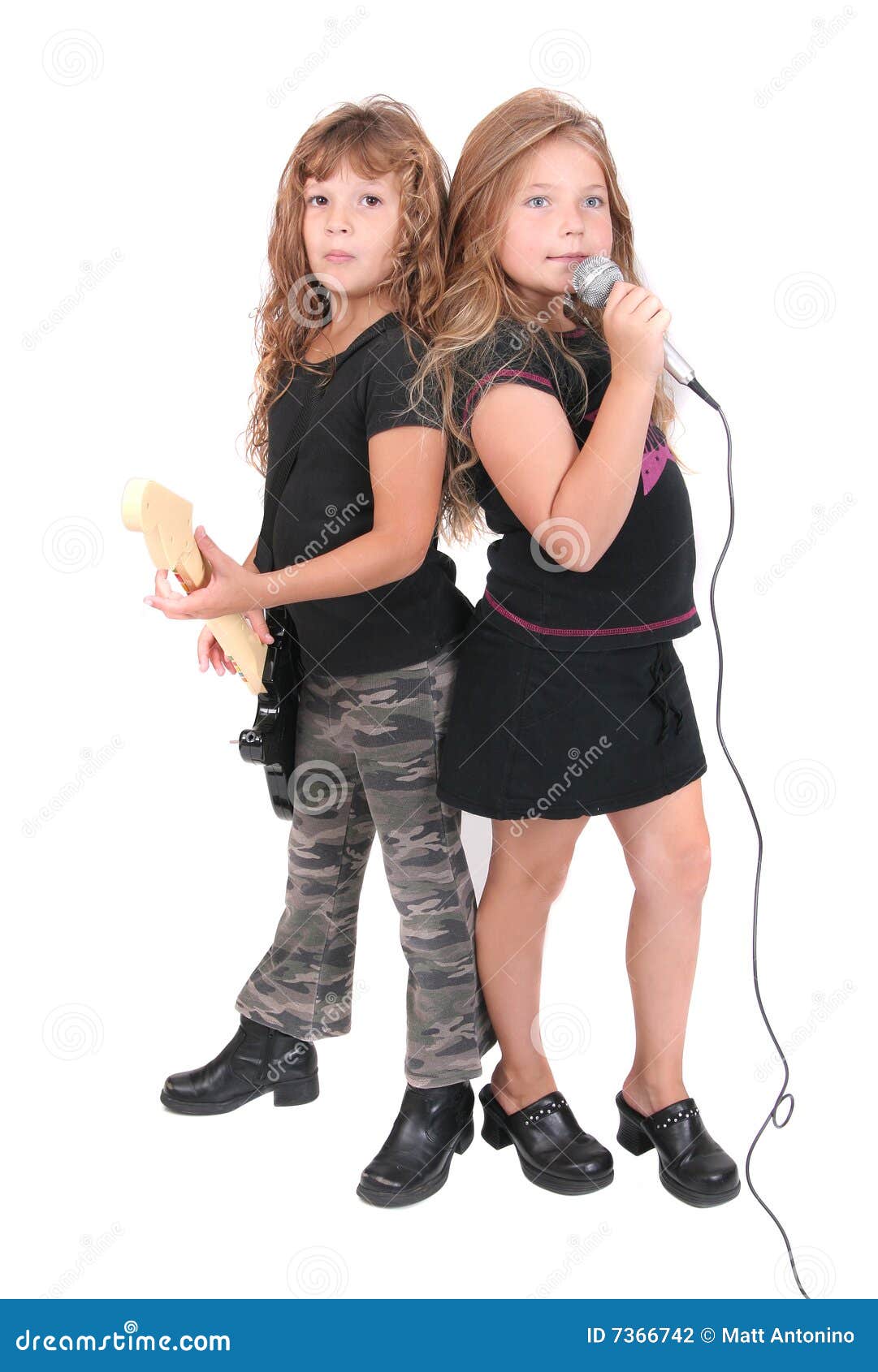 Two rockstar kids stock photo. Image of holding, music - 7366742