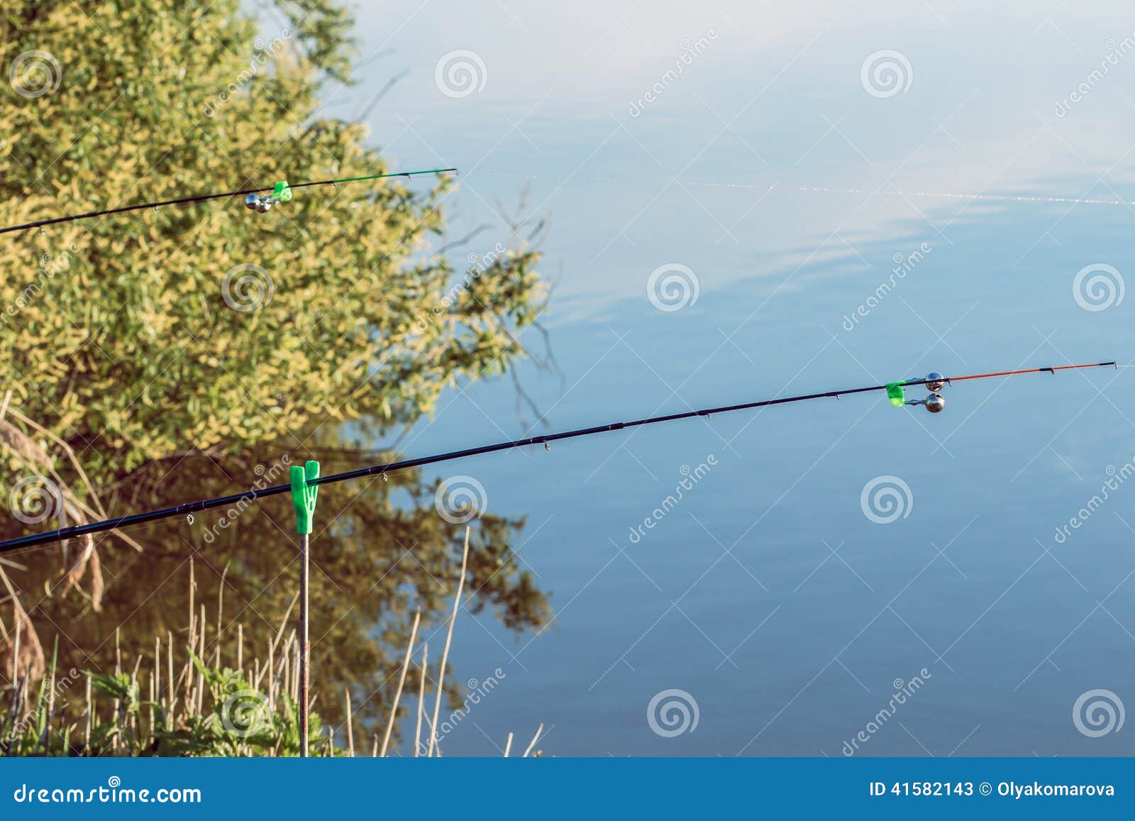 Two Rods on the River while Fishing Stock Image - Image of riverside ...
