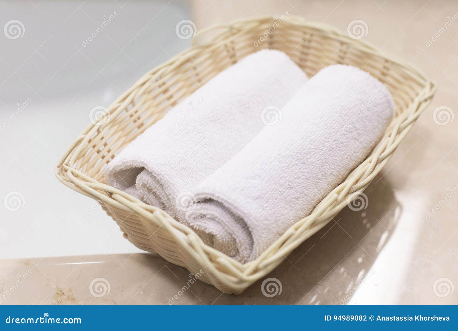 Two Rolled White Hand Towels in Light Rectangular Basket on the Stock ...