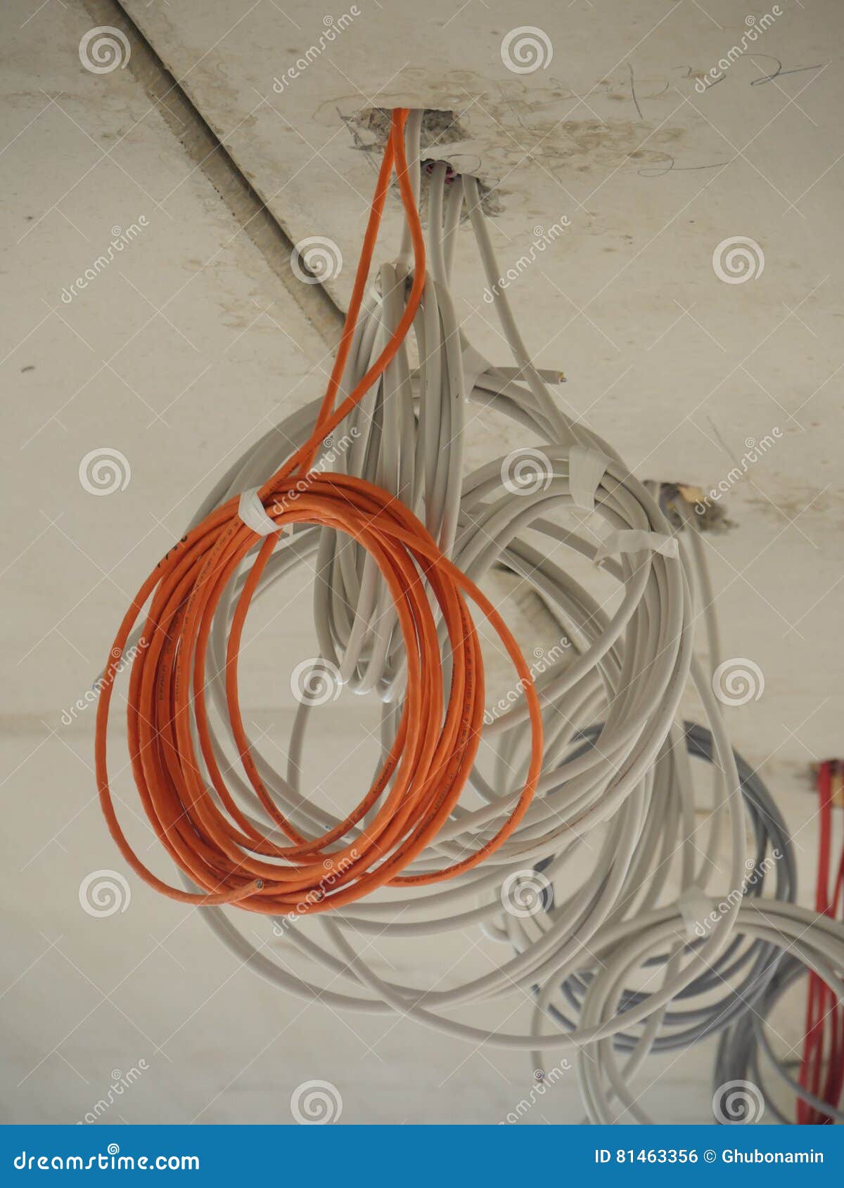Two Rolled Wires Sticking Out of Ceiling Stock Photo - Image of ...