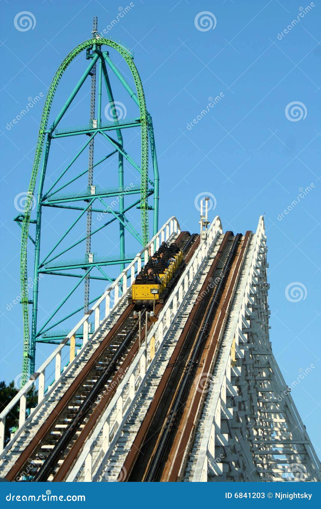 Two roller coasters stock image. Image of entertainment - 6841203