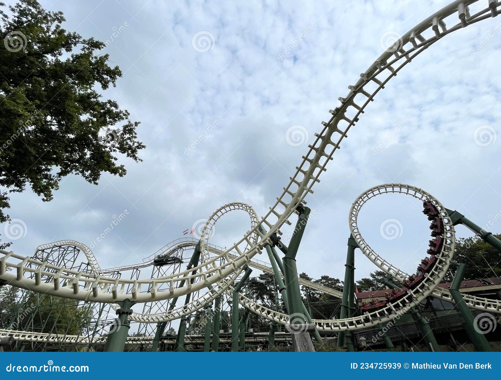 Two Rollercoasters Next To a Lake in a Themepark Stock Image - Image of ...