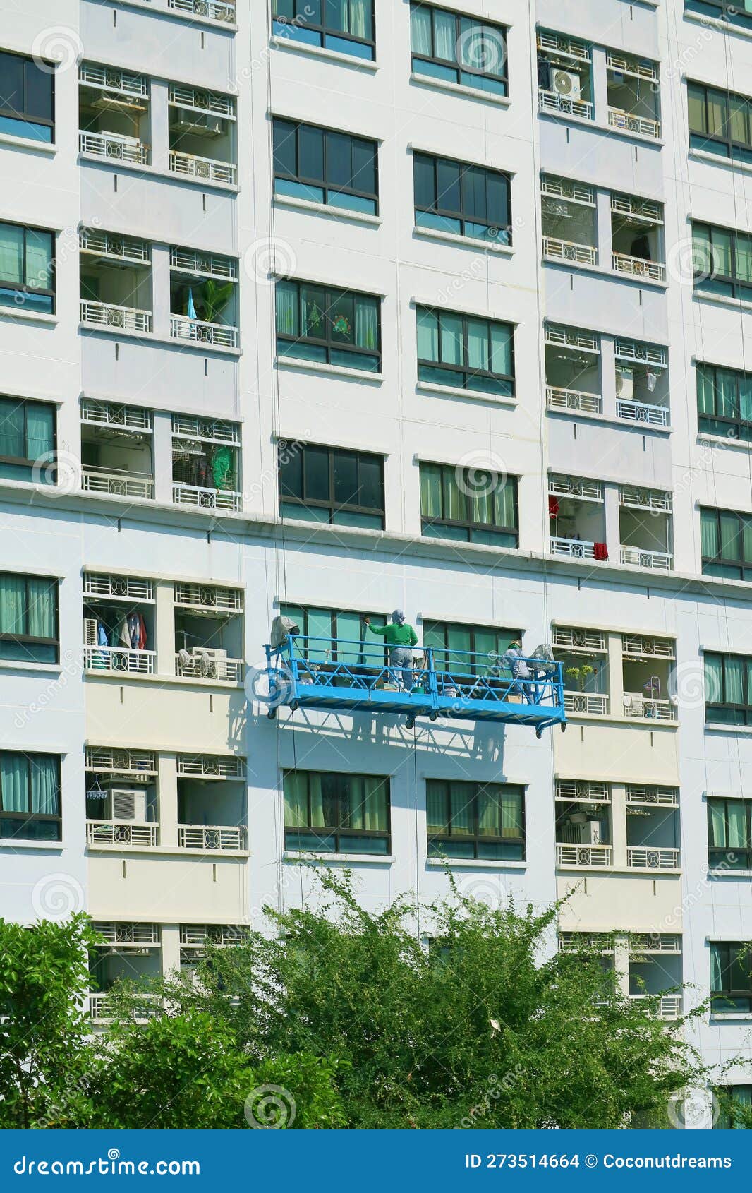Two of Rope Access Workers Painting the Facade of a Modern Building ...