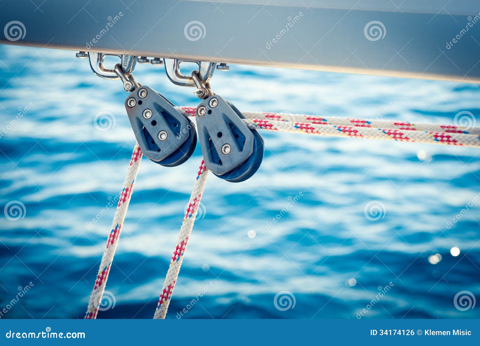 Two Ropes and Pulleys on Boom Stock Photo - Image of equipment, sailing ...