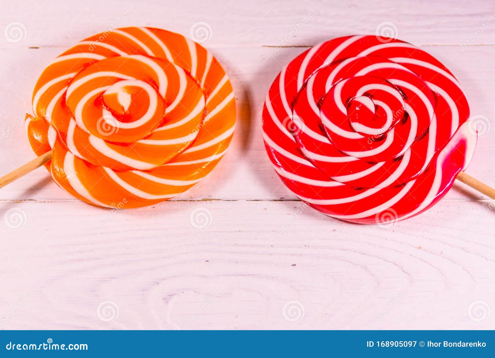 Two Round Lollipops on a Wooden Table. Top View Stock Image - Image of ...