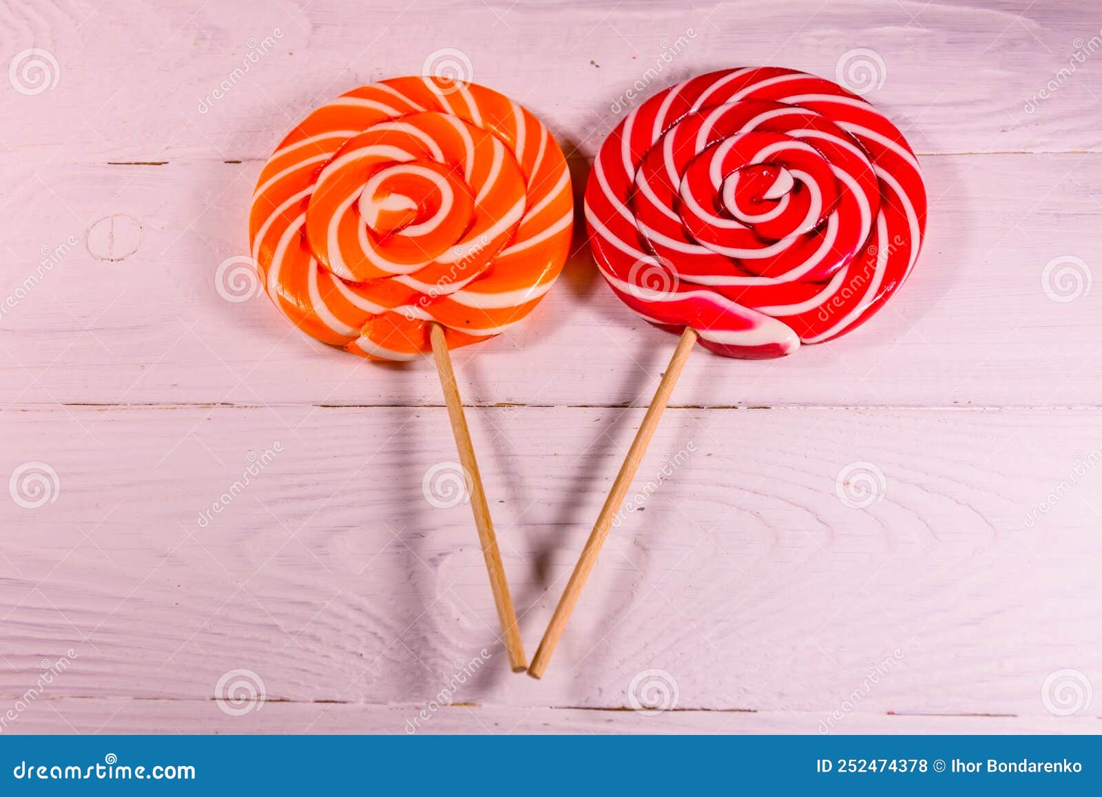 Two Round Lollipops on a Wooden Table. Top View Stock Photo - Image of ...