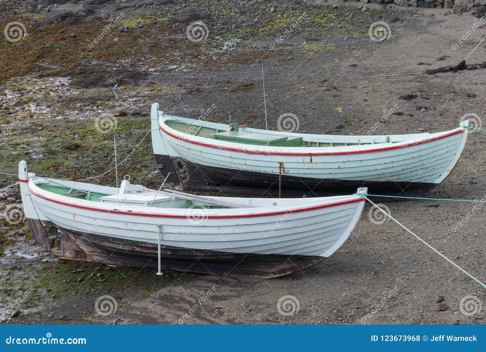 Two row boats , shore line stock photo. Image of coastline - 123673968