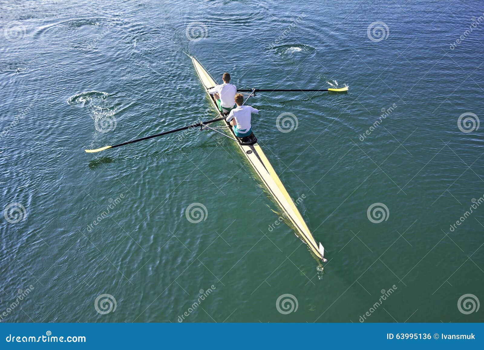 Two rowers in a boat editorial photo. Image of outdoors - 63995136