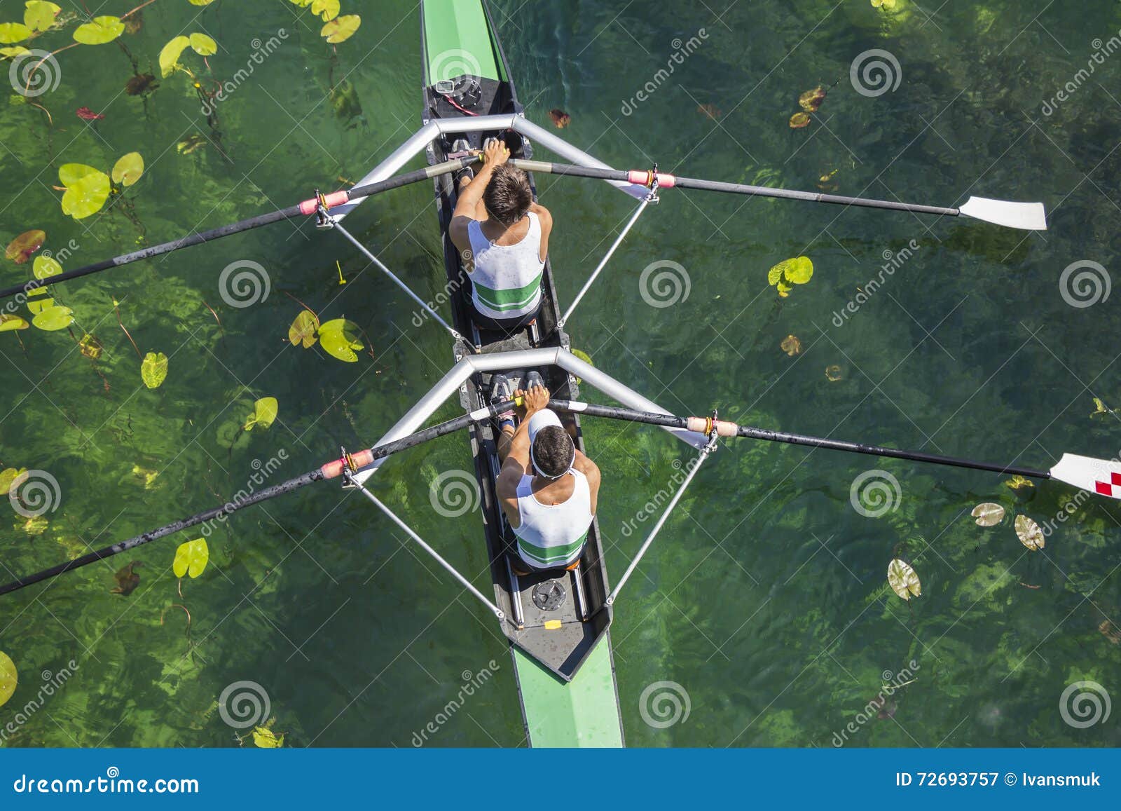 Two rowers rowing editorial photography. Image of canoe - 72693757
