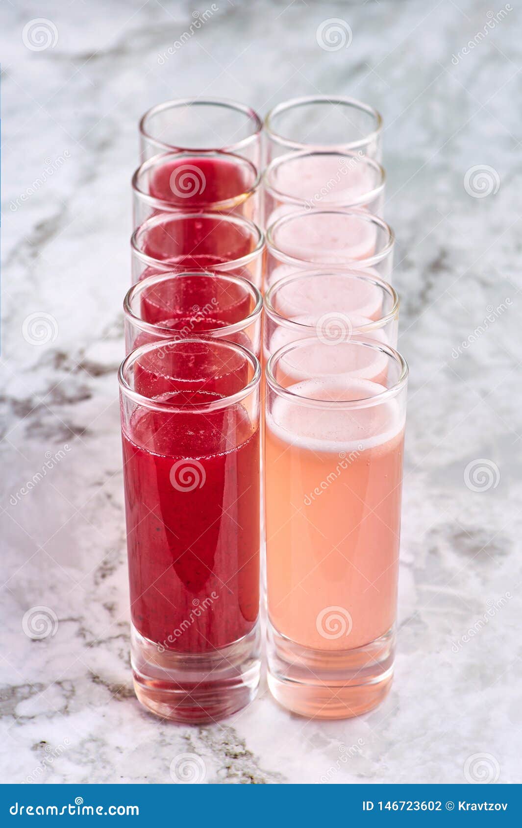 Two Rows of Alcohol Shot Cocktails. Coral and Red Colored Drinks Stock ...