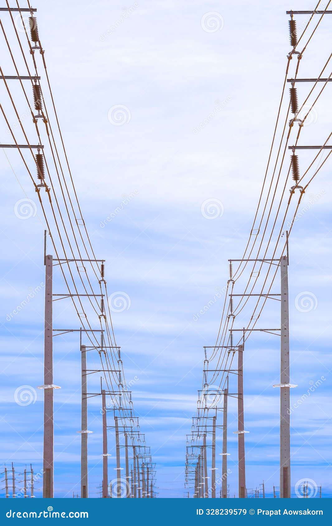 Two Rows of Electric Poles with Cable Lines Against White Cloudy on ...