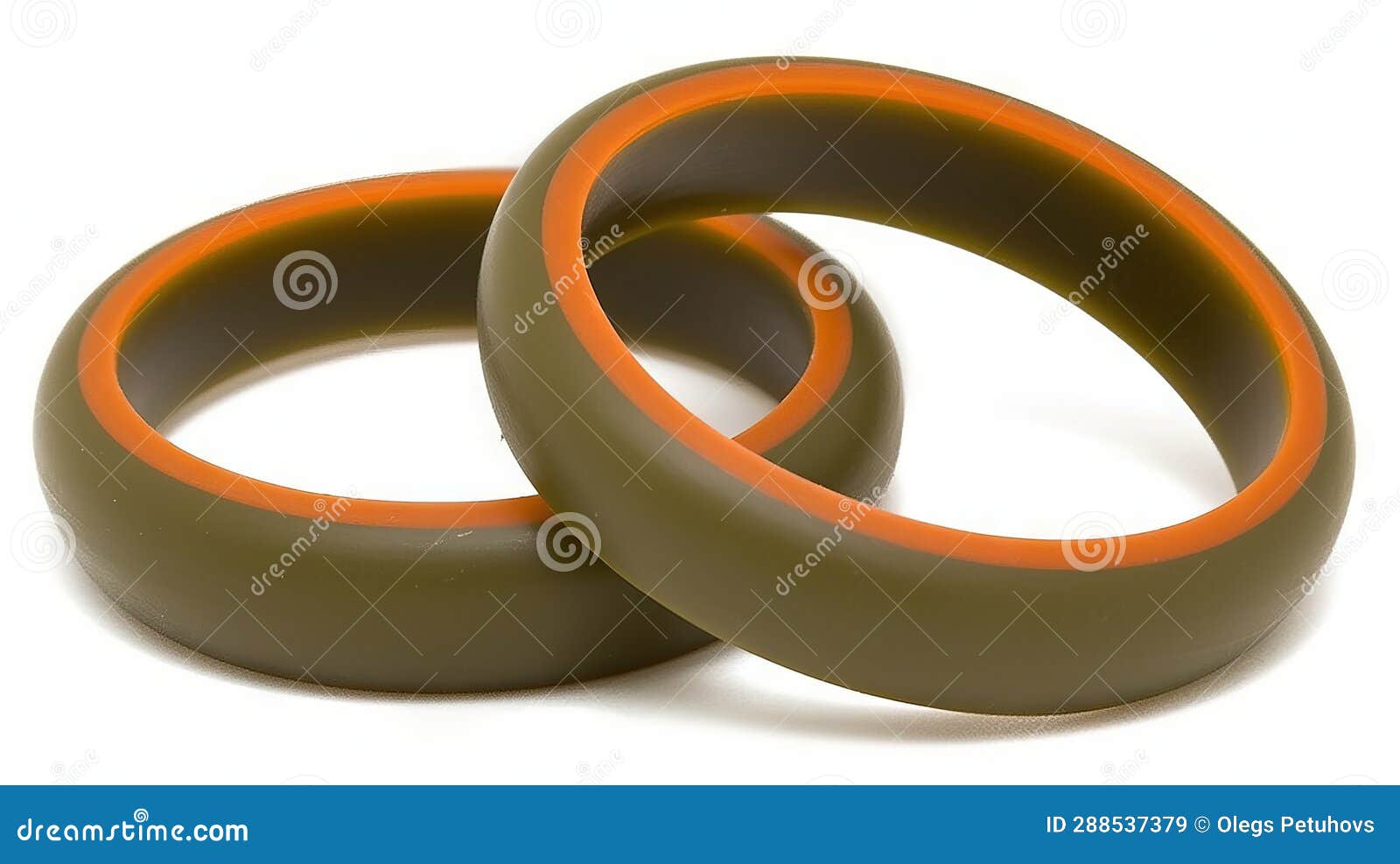 Two Rubber Rings with an Orange Ring on Top of Each Other on a White ...
