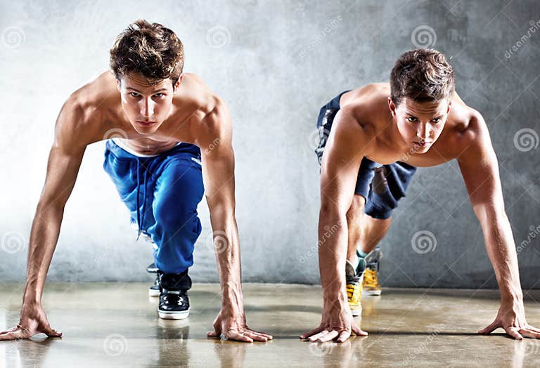 Two runners on start stock image. Image of athletic, power - 19207779