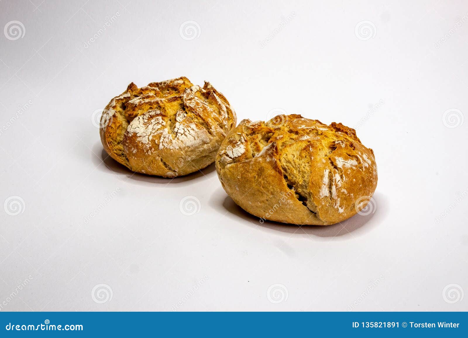 Two rustic bread rolls stock image. Image of table, rustic - 135821891