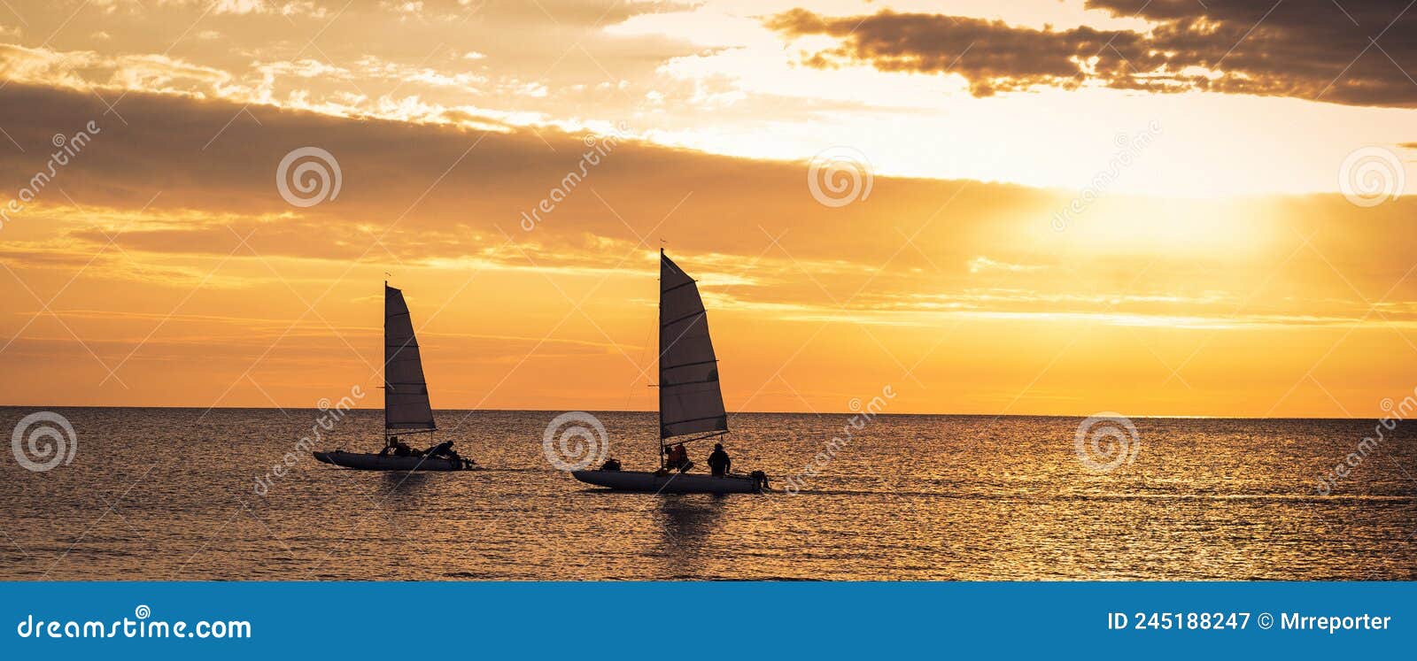 Two sailboats sunset sea editorial photography. Image of tallships ...