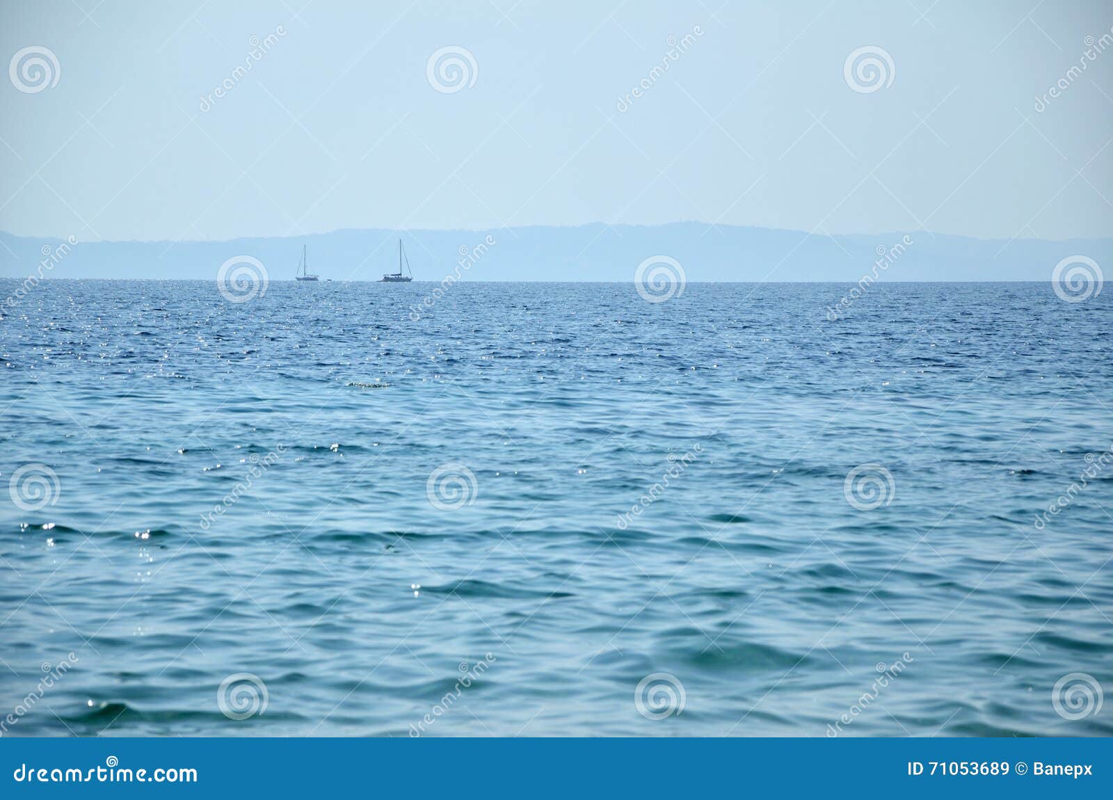 Two Sailing Boats in Distance Stock Image - Image of outdoor, blue ...