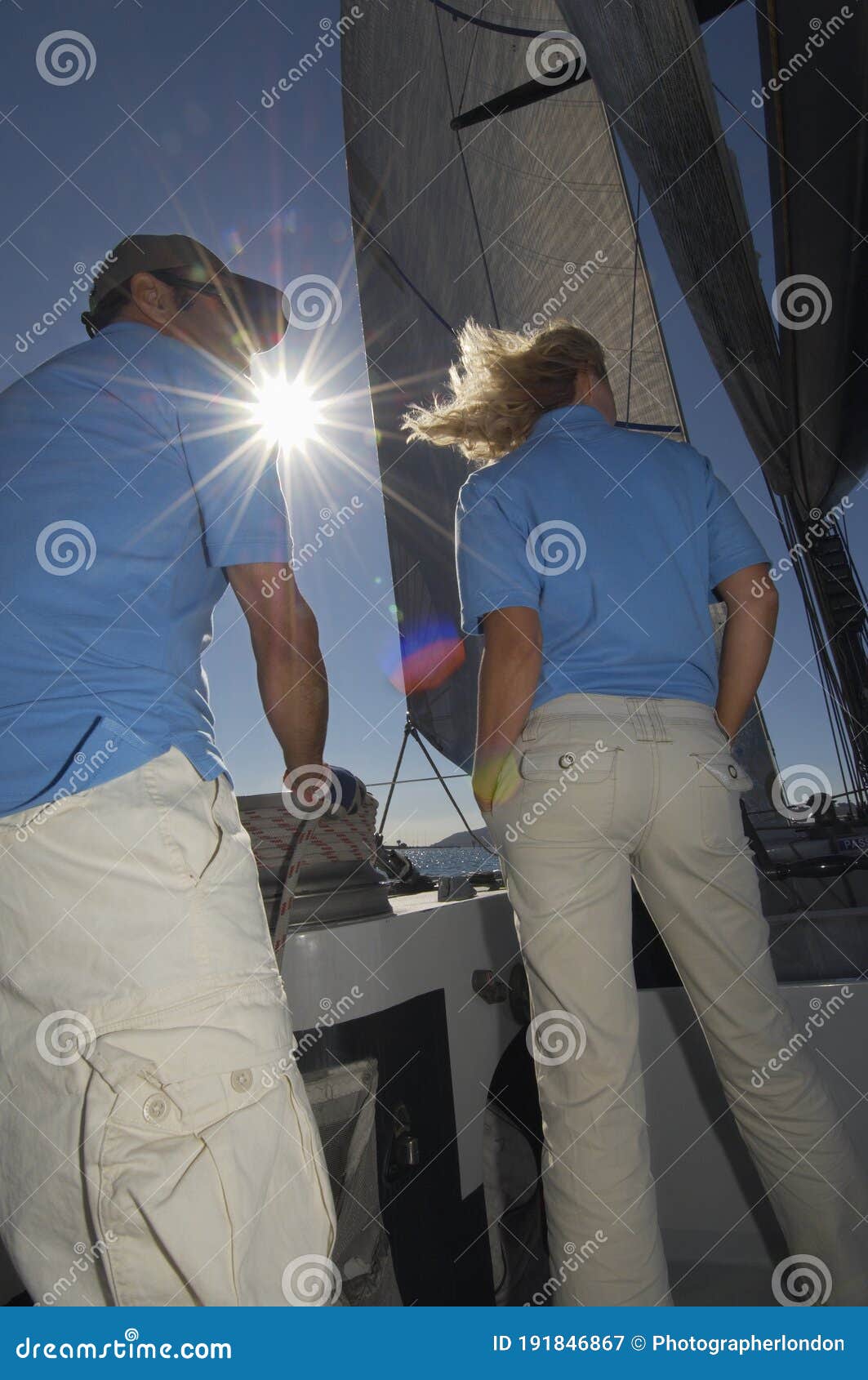 Photo of Two Sailors on Sailboat Stock Image - Image of yachting ...