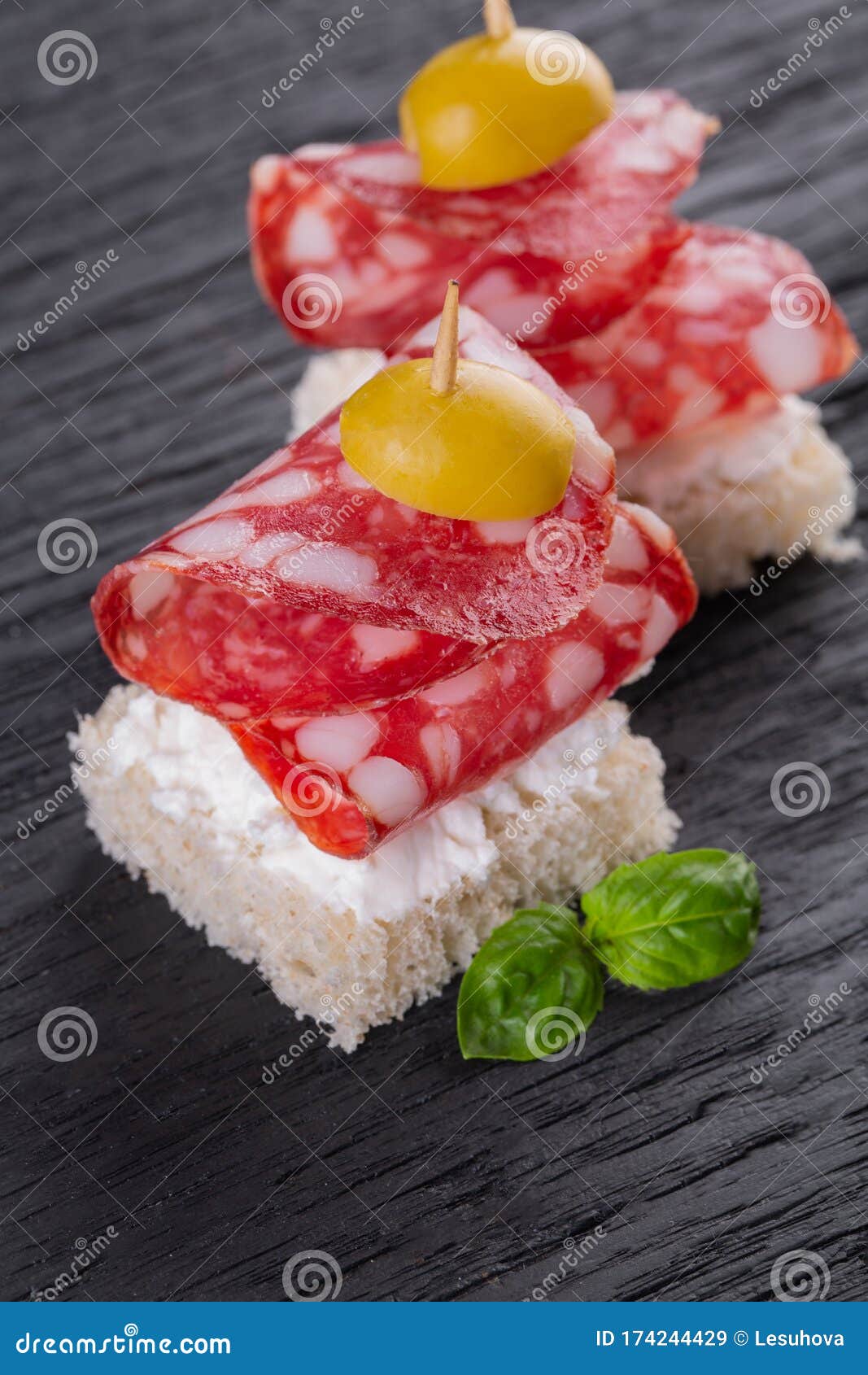 Two salami canapes stock image. Image of lunch, crispy - 174244429