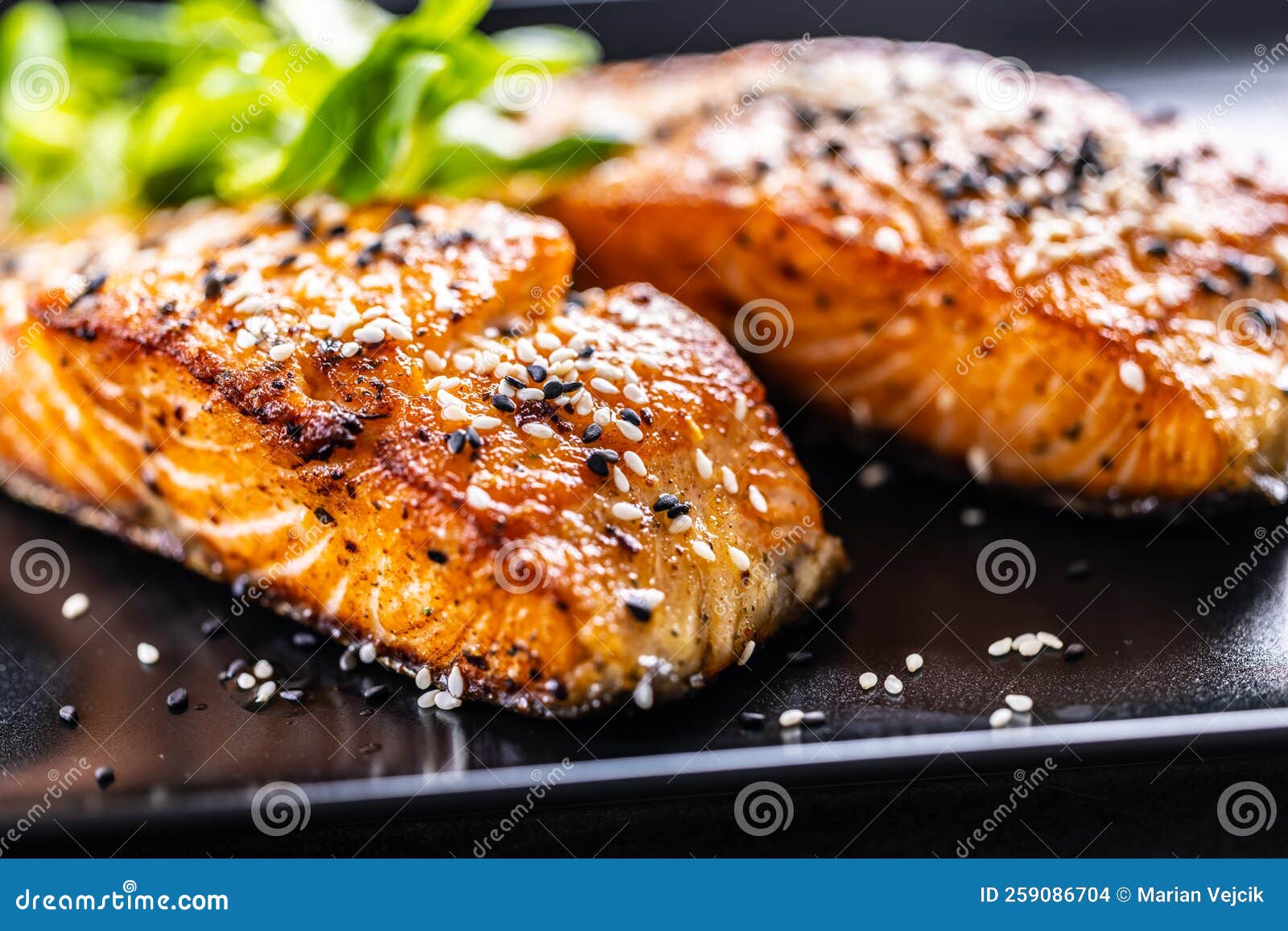 Two Salmon Fillets Baked until Crispy with Sesame - Close Up Stock ...
