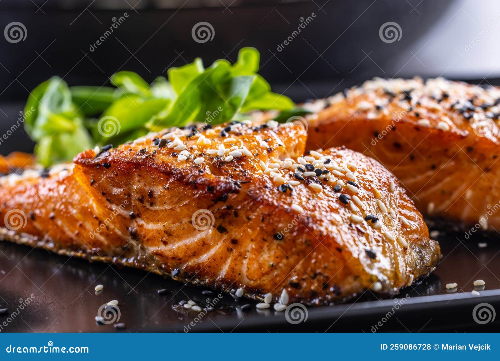 Two Salmon Fillets Baked until Crispy with Sesame - Close Up Stock ...