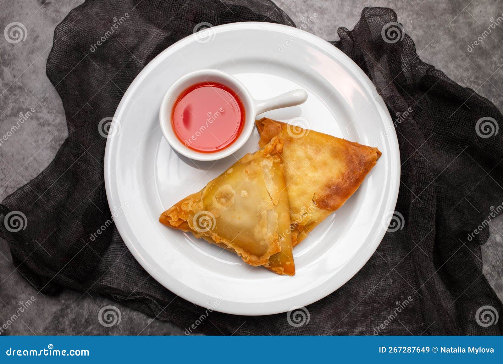 Two Samosas with Meat and Vegetables on White Plate Stock Image - Image ...