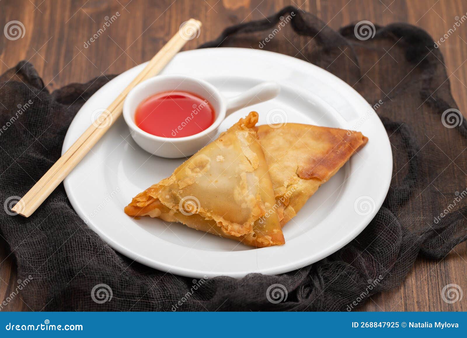 Two Samosas with Meat and Vegetables on White Plate Stock Image - Image ...