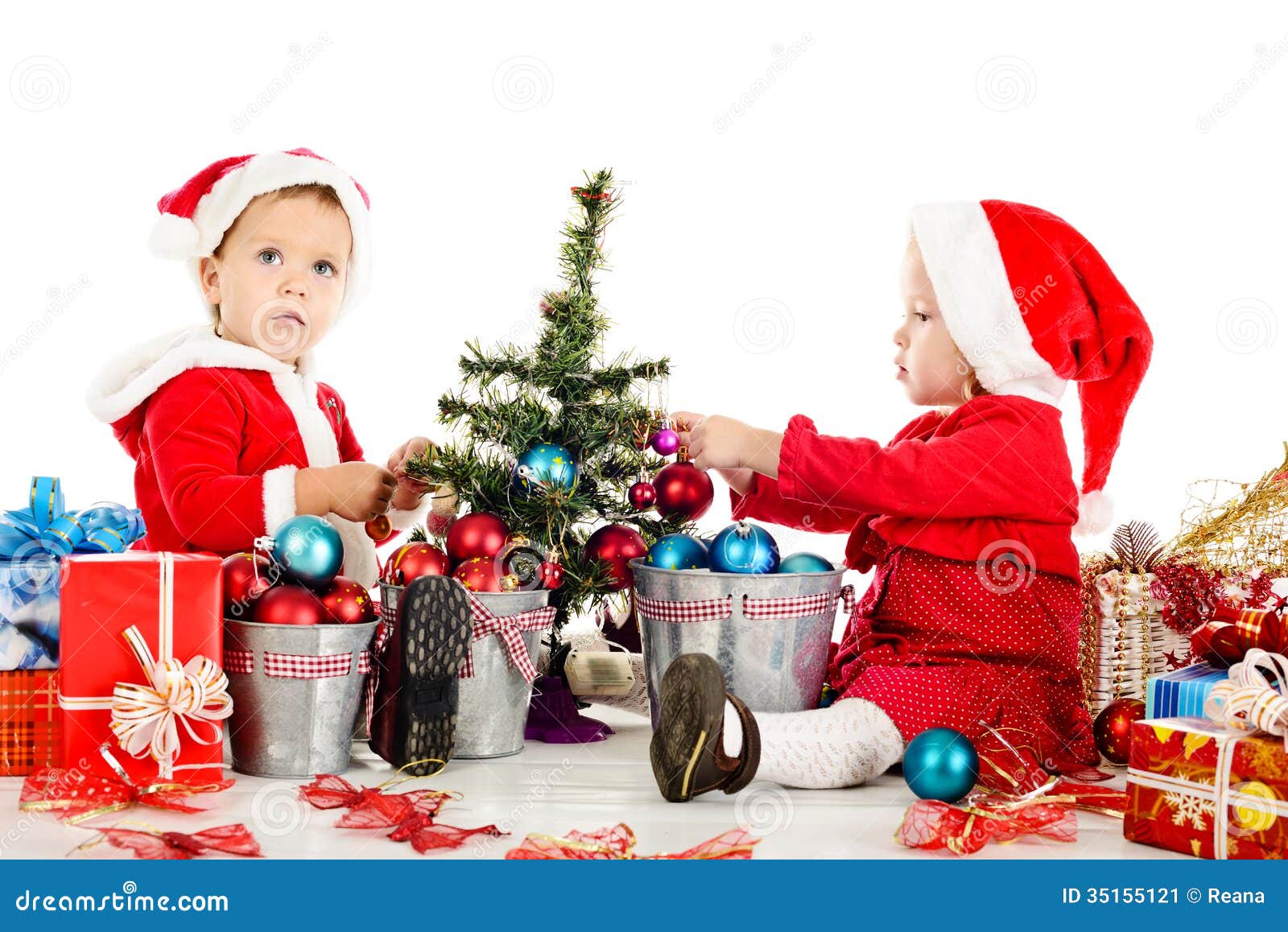 Two santa helpers stock image. Image of people, holiday - 35155121