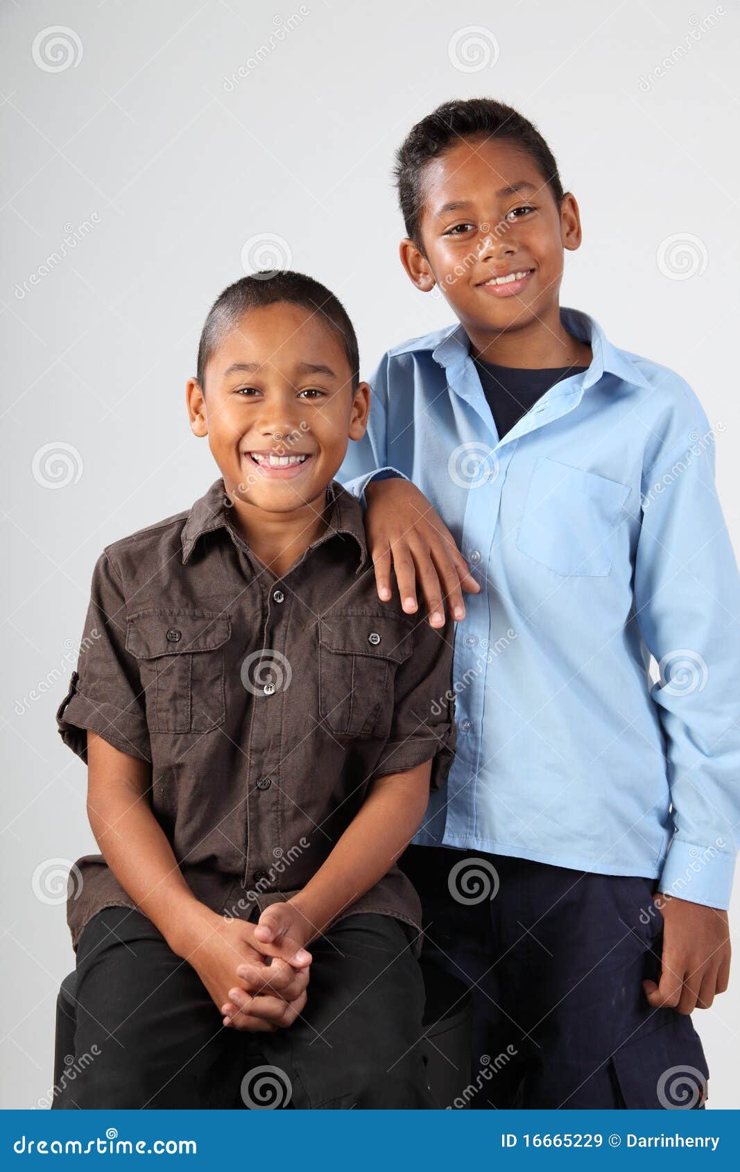 Two School Boys Pose Happily Together in Studio Stock Image - Image of ...