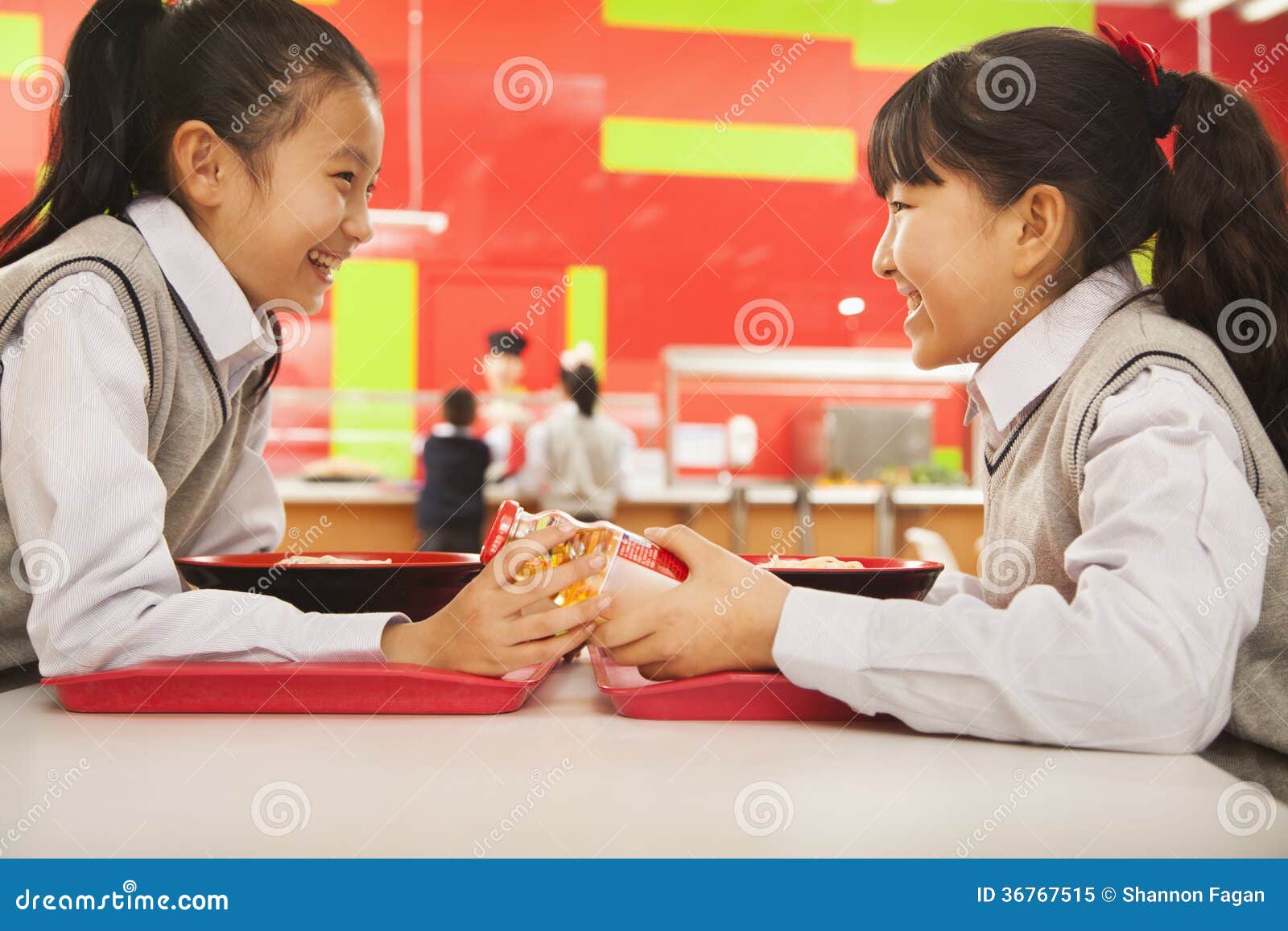 Two School Girls Talk Over Lunch in School Cafeteria Stock Image ...