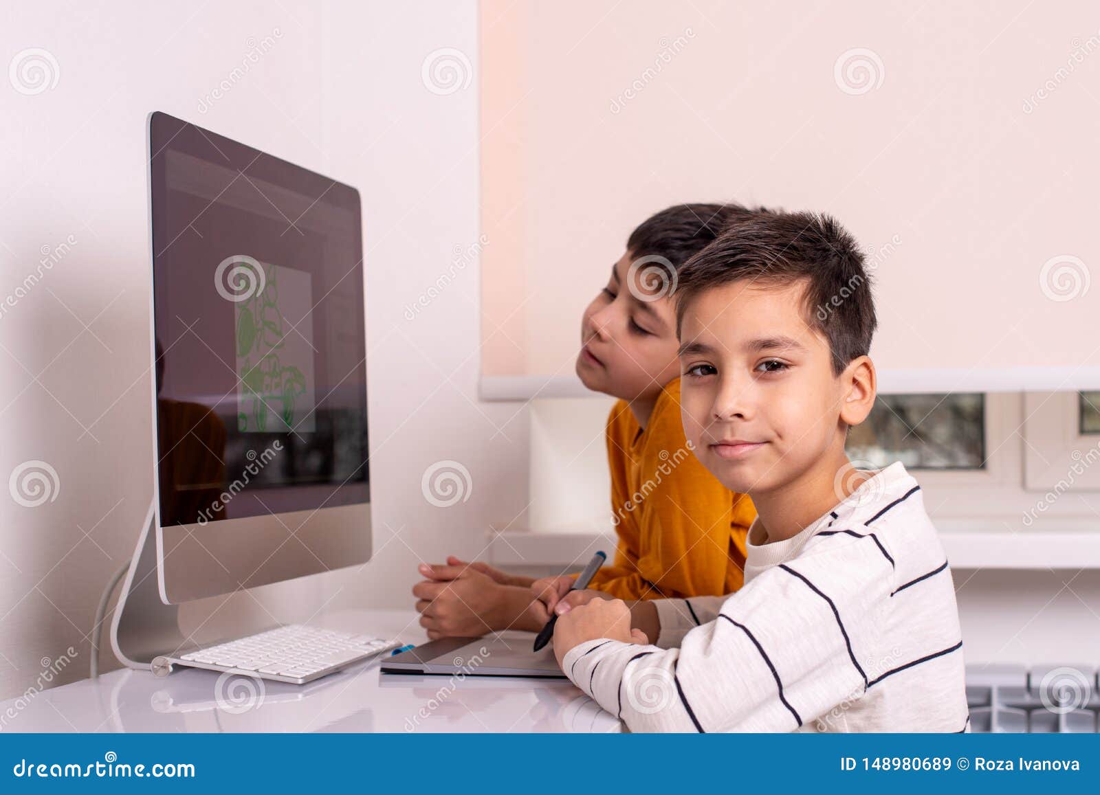 Two Schoolboys Drawing on a Computer Using a Tablet Stock Image - Image ...