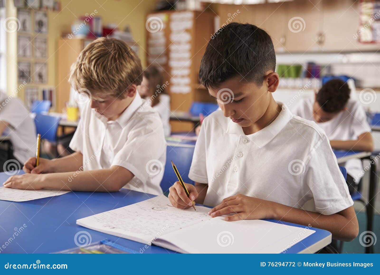 Two Schoolboys Working in a Primary School Class, Close Up Stock Photo ...