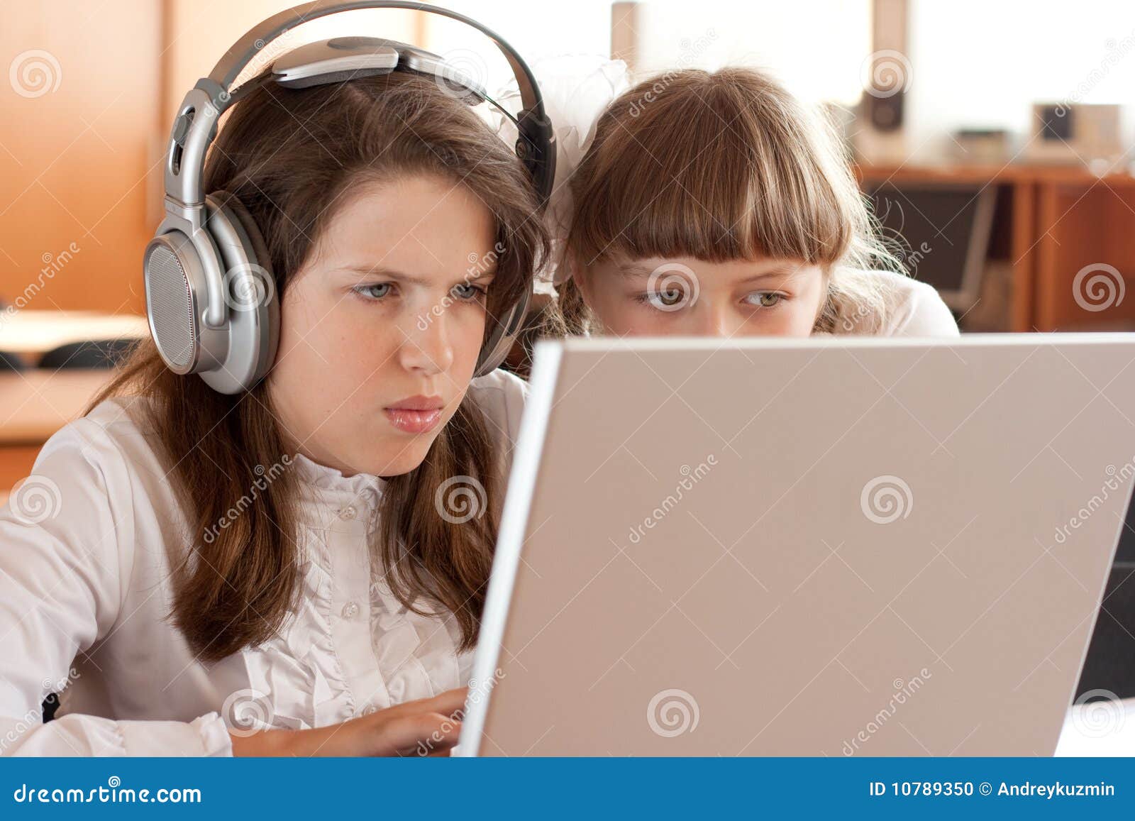 Two Schoolgirls with Notebook Stock Photo - Image of cute, headphones ...