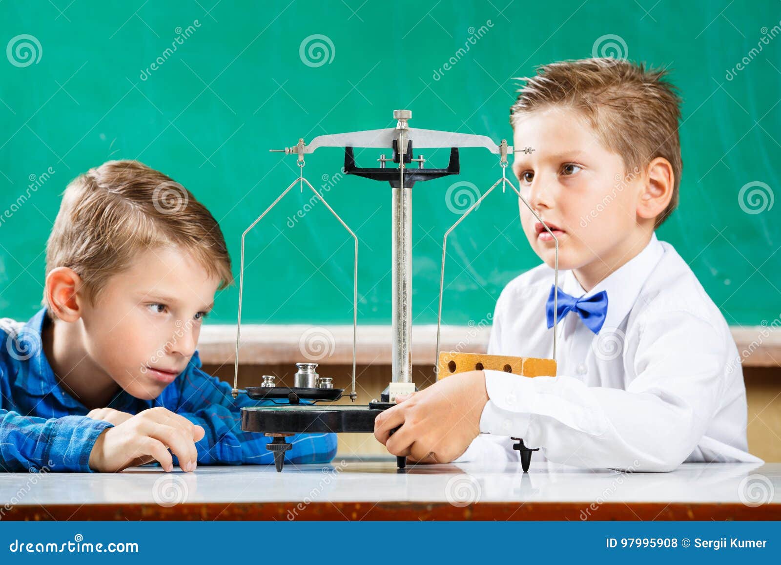 Two Schoolmates Use Scales on Lesson in School Stock Photo - Image of ...