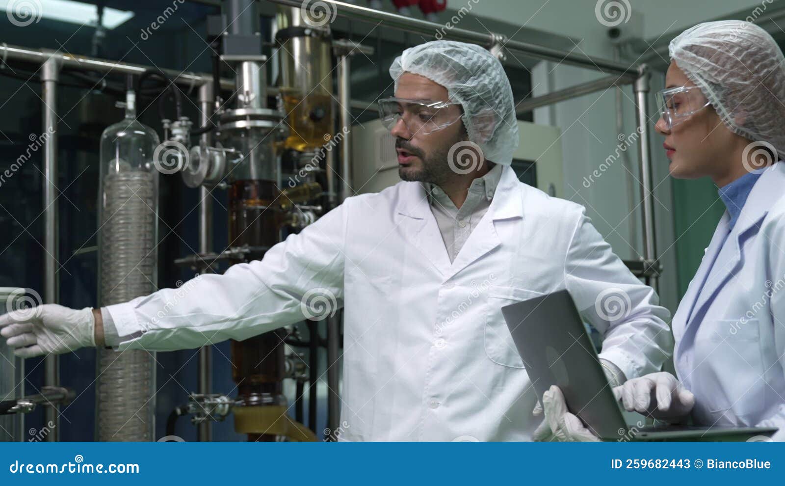 Two Scientist in Professional Uniform Working in Curative Laboratory ...