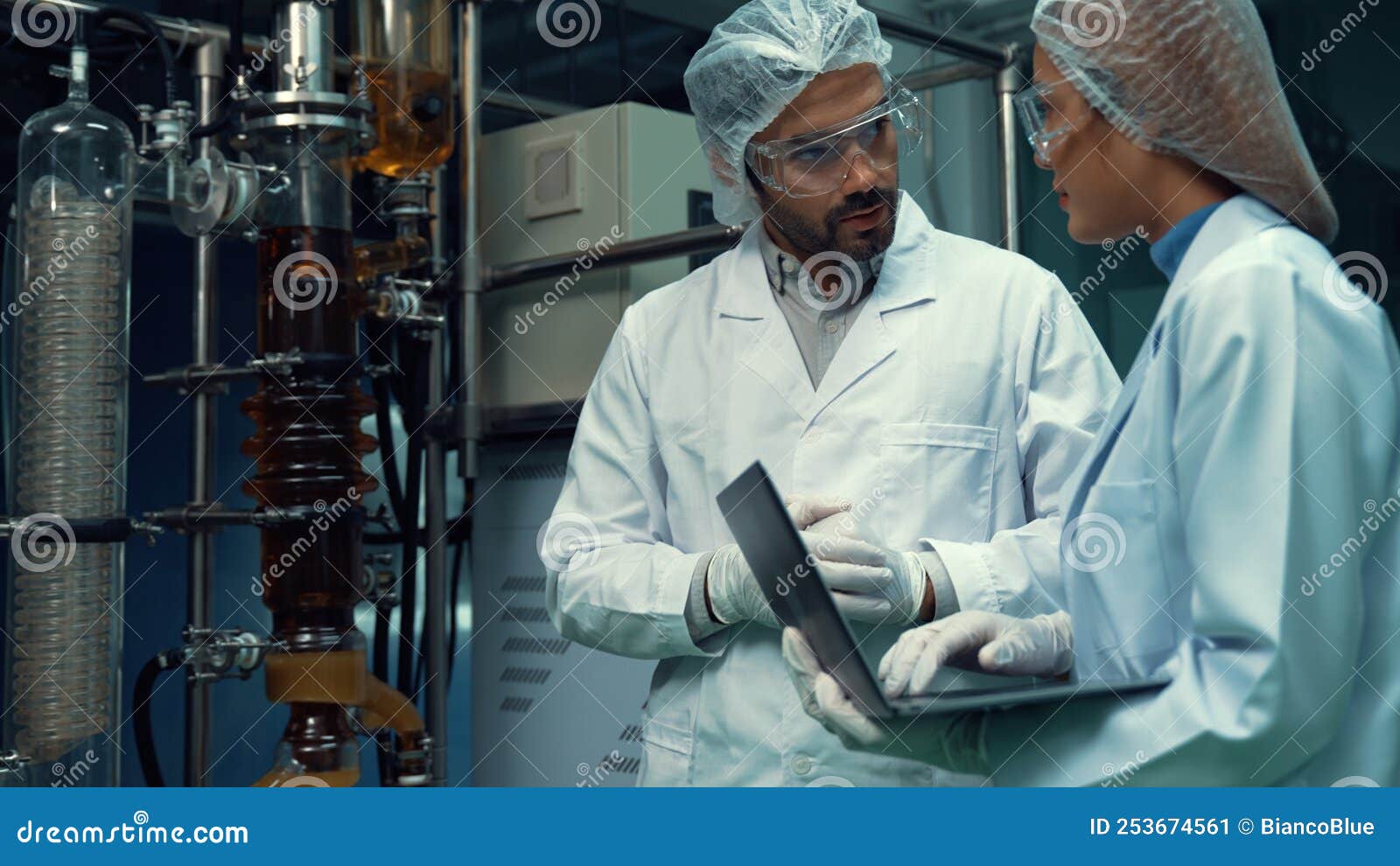 Two Scientist in Professional Uniform Working in Laboratory Stock Image ...