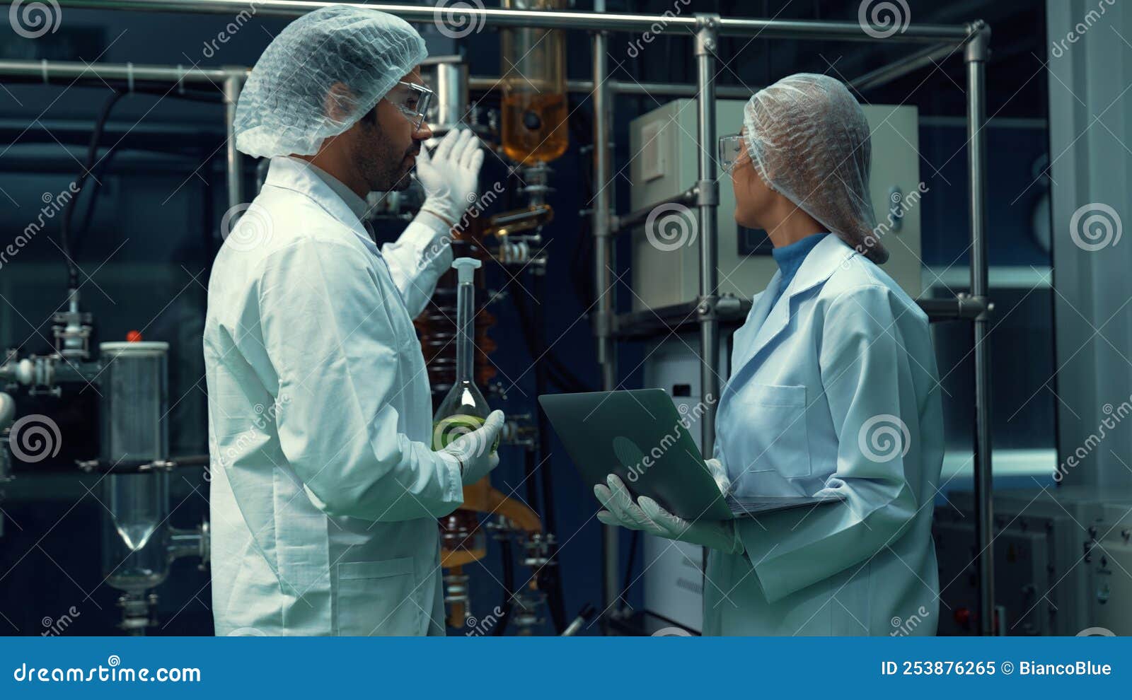 Two Scientist in Professional Uniform Working in Laboratory Stock Image ...