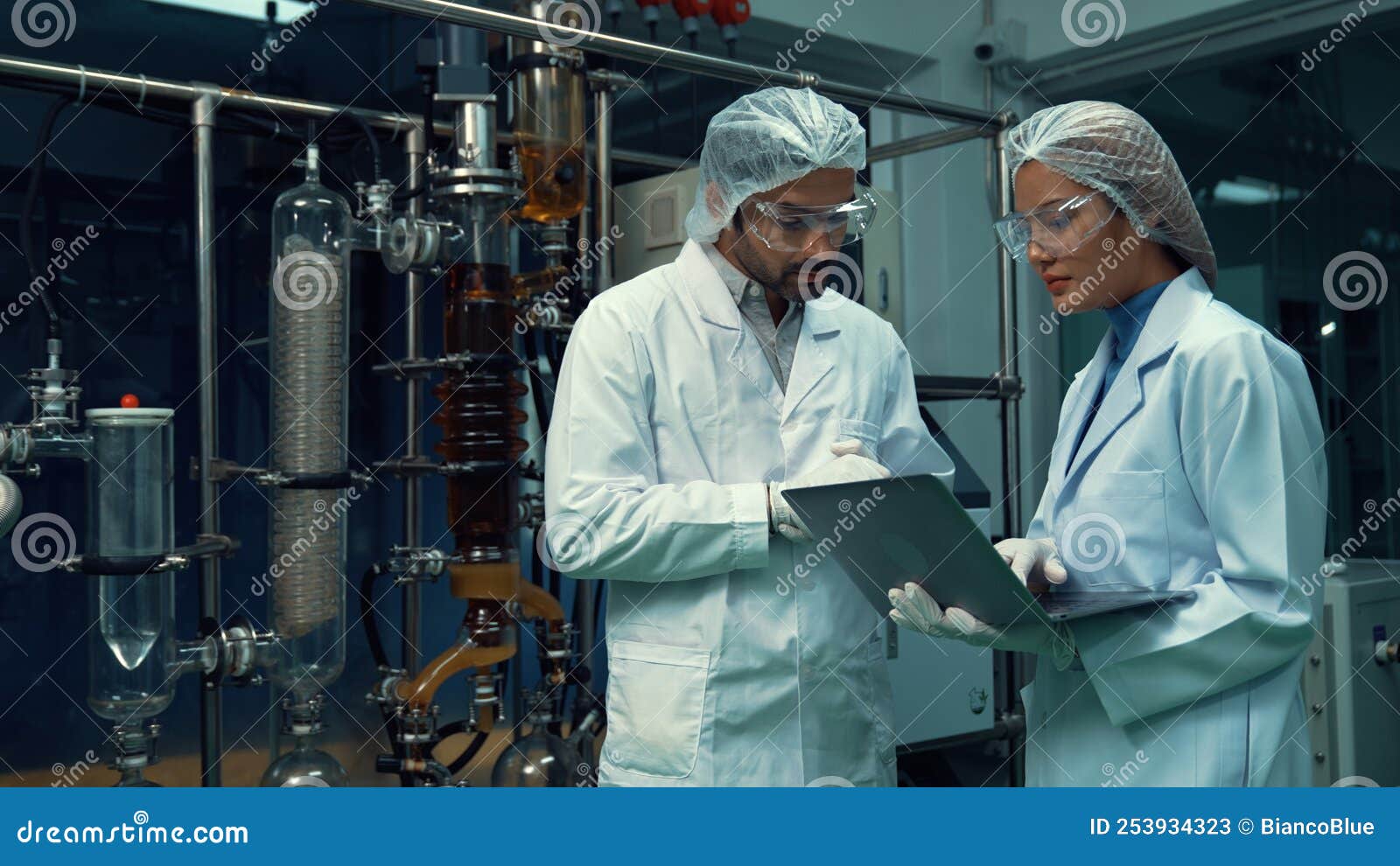 Two Scientist in Professional Uniform Working in Laboratory Stock Image ...