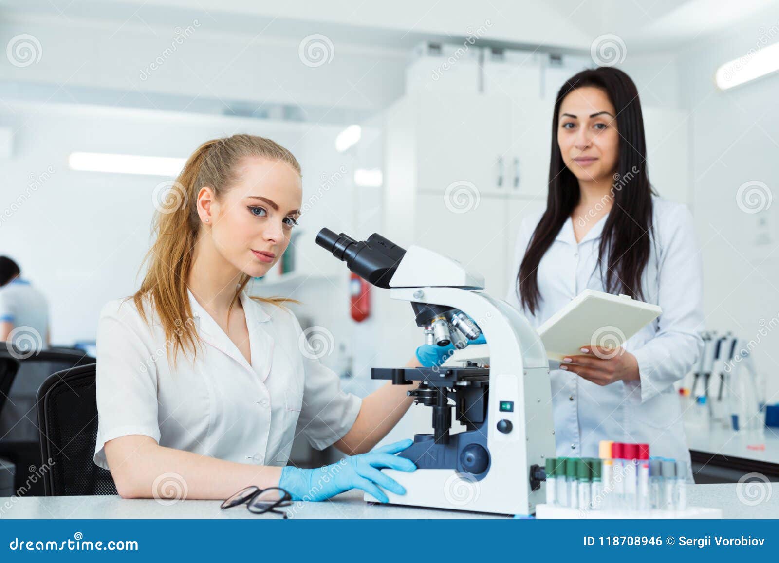 Two Scientists Conducting Research in a Lab Environment Stock Photo ... Two Scientists Conducting Research in a Lab Environment Stock Photo ...
