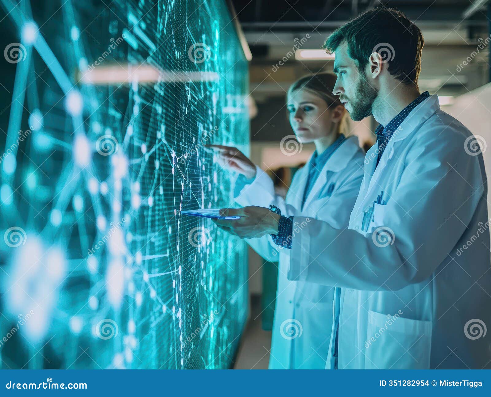 Two Scientists or Engineers Examining an Interactive Circuit Board ...