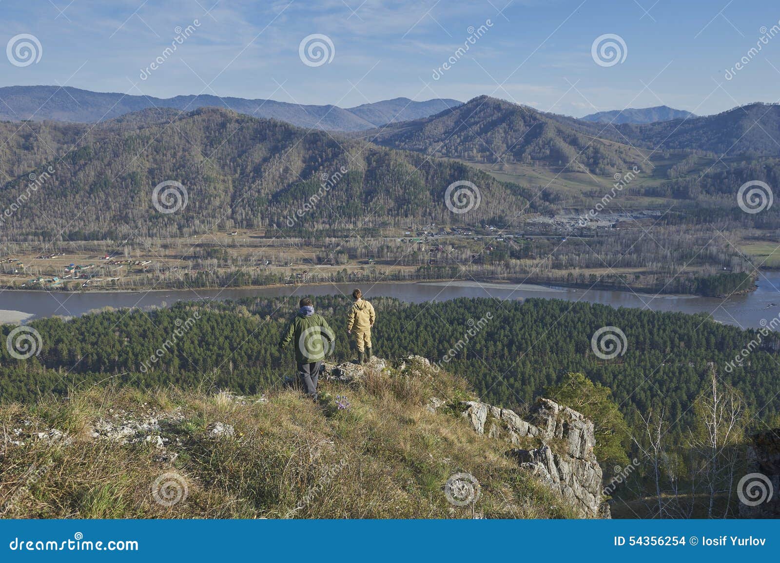 Two Scientists Standing on Top of a Hill Stock Photo - Image of boulder ... Two Scientists Standing on Top of a Hill Stock Photo - Image of boulder ...