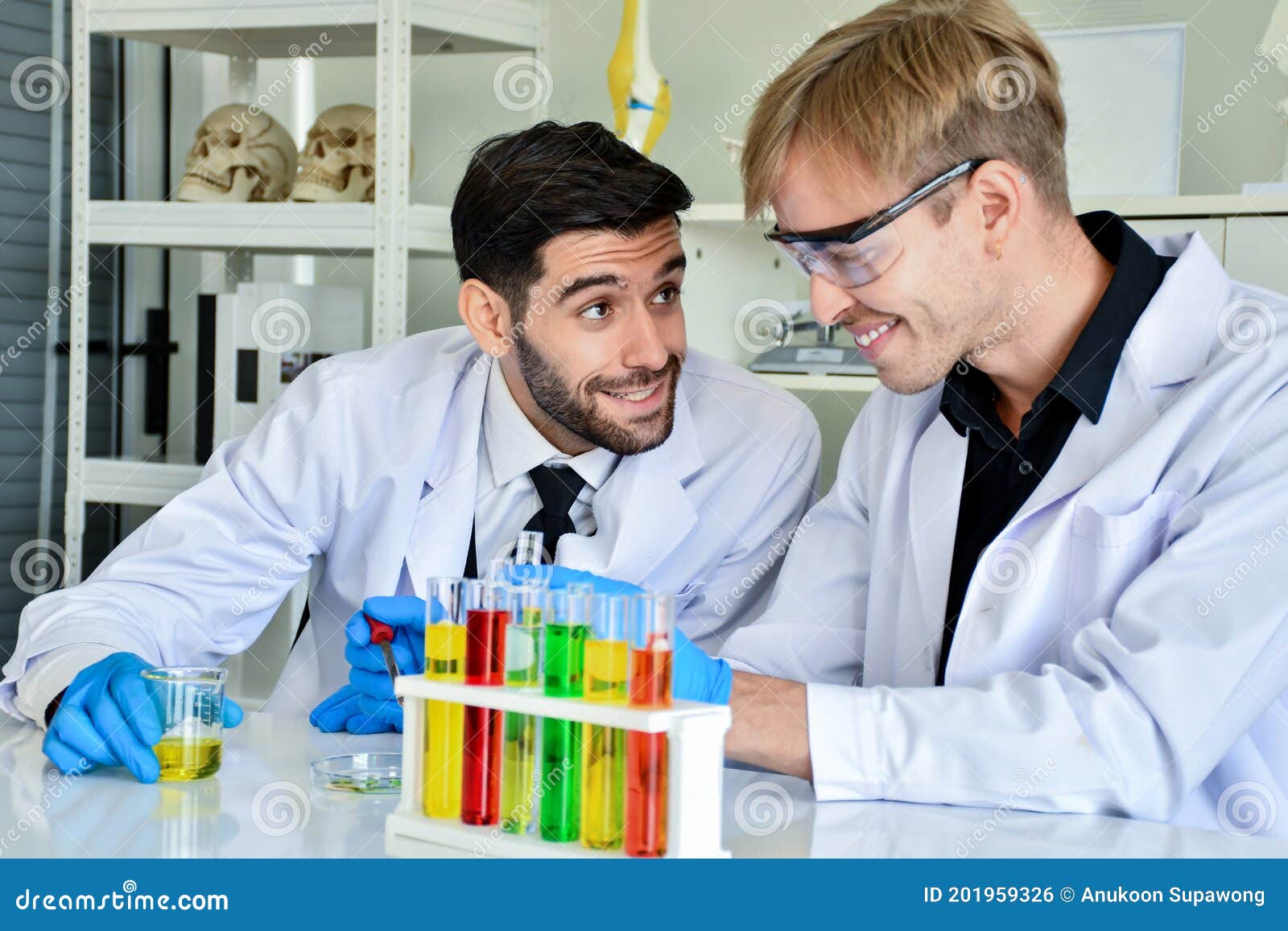 Two Scientists Talk about Chemical Samples in the Lab about the Results ...