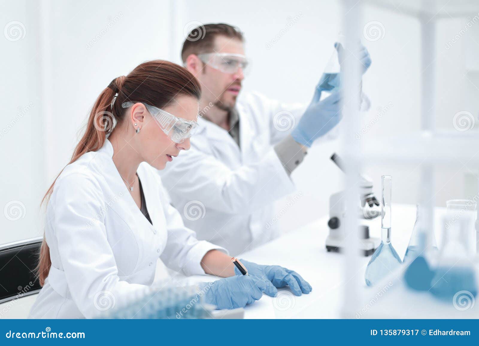 Two Scientists Work in the Laboratory. Stock Image - Image of ...