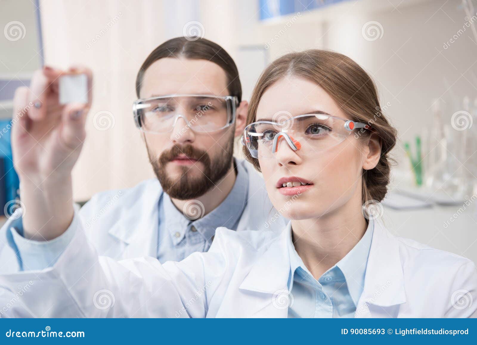 Two scientists at work stock image. Image of looking - 90085693