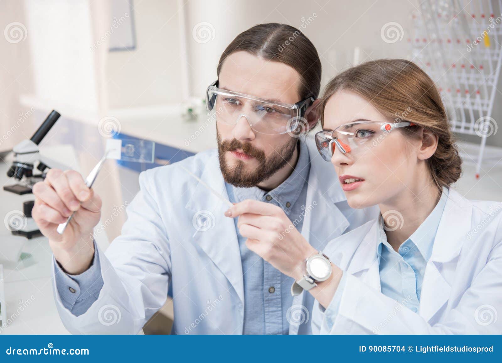 Two scientists at work stock photo. Image of laboratory - 90085704