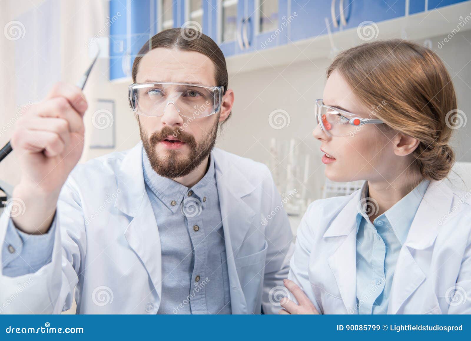 Two scientists at work stock image. Image of analyzing - 90085799