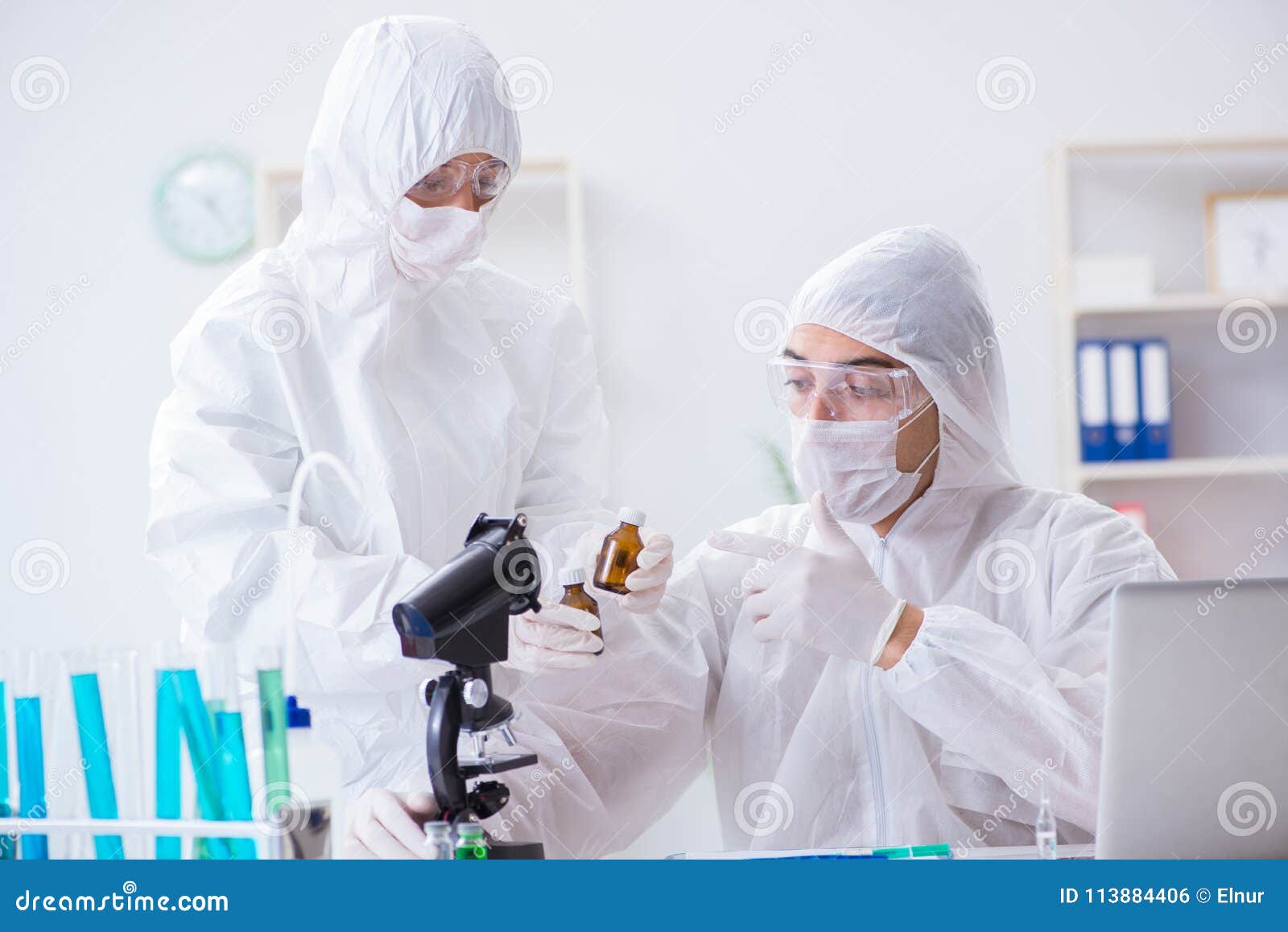 The Two Scientists Working in the Chemical Lab Stock Photo - Image of ... The Two Scientists Working in the Chemical Lab Stock Photo - Image of ...