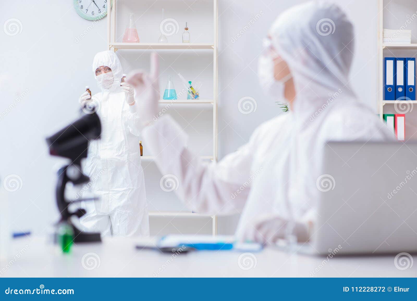 The Two Scientists Working in the Chemical Lab Stock Photo - Image of ... The Two Scientists Working in the Chemical Lab Stock Photo - Image of ...
