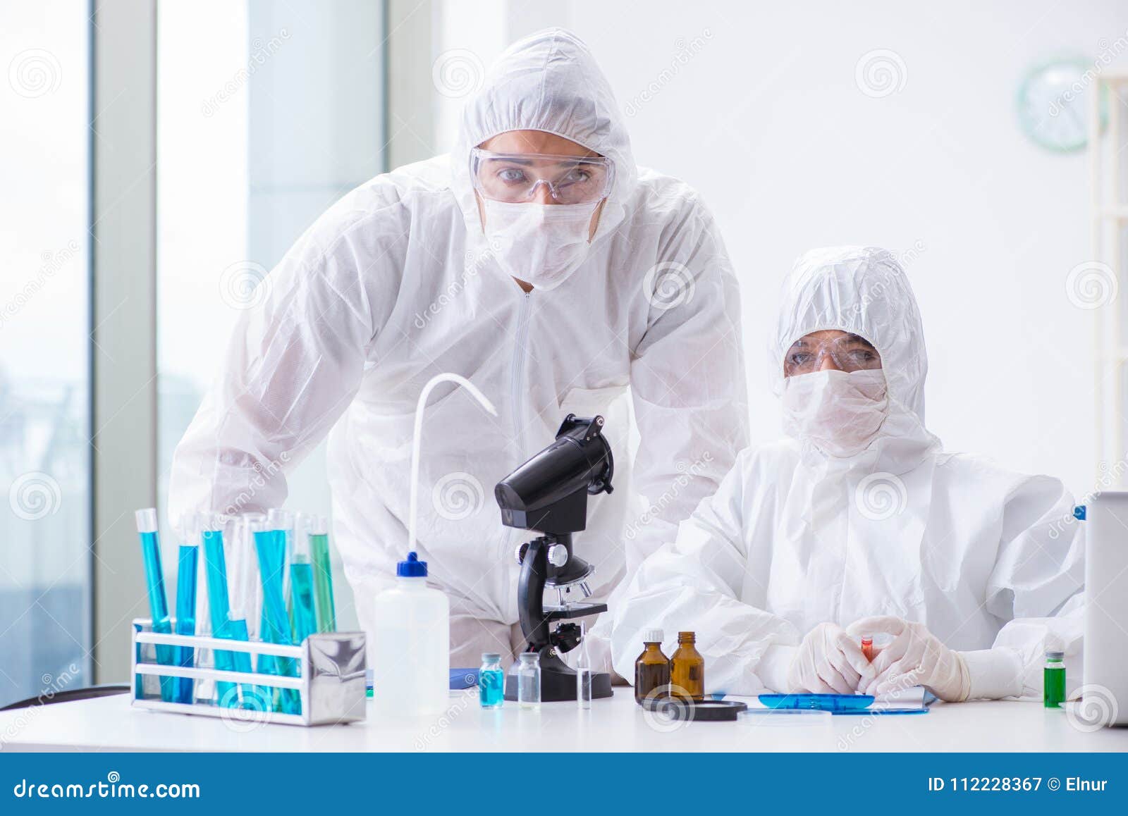 The Two Scientists Working in the Chemical Lab Stock Image - Image of ... The Two Scientists Working in the Chemical Lab Stock Image - Image of ...