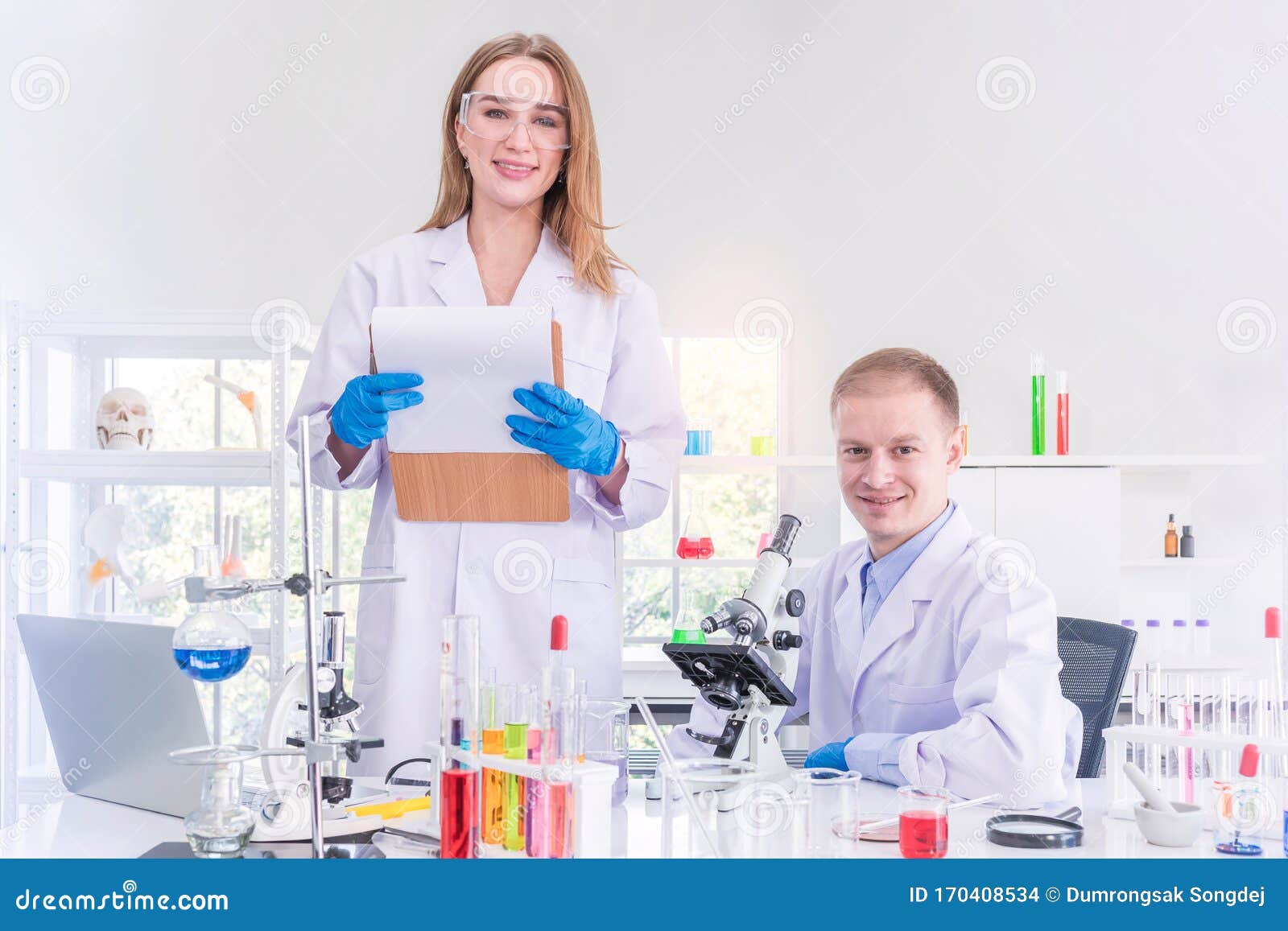 Two Scientists Working in Chemical Laboratory Stock Photo - Image of ...