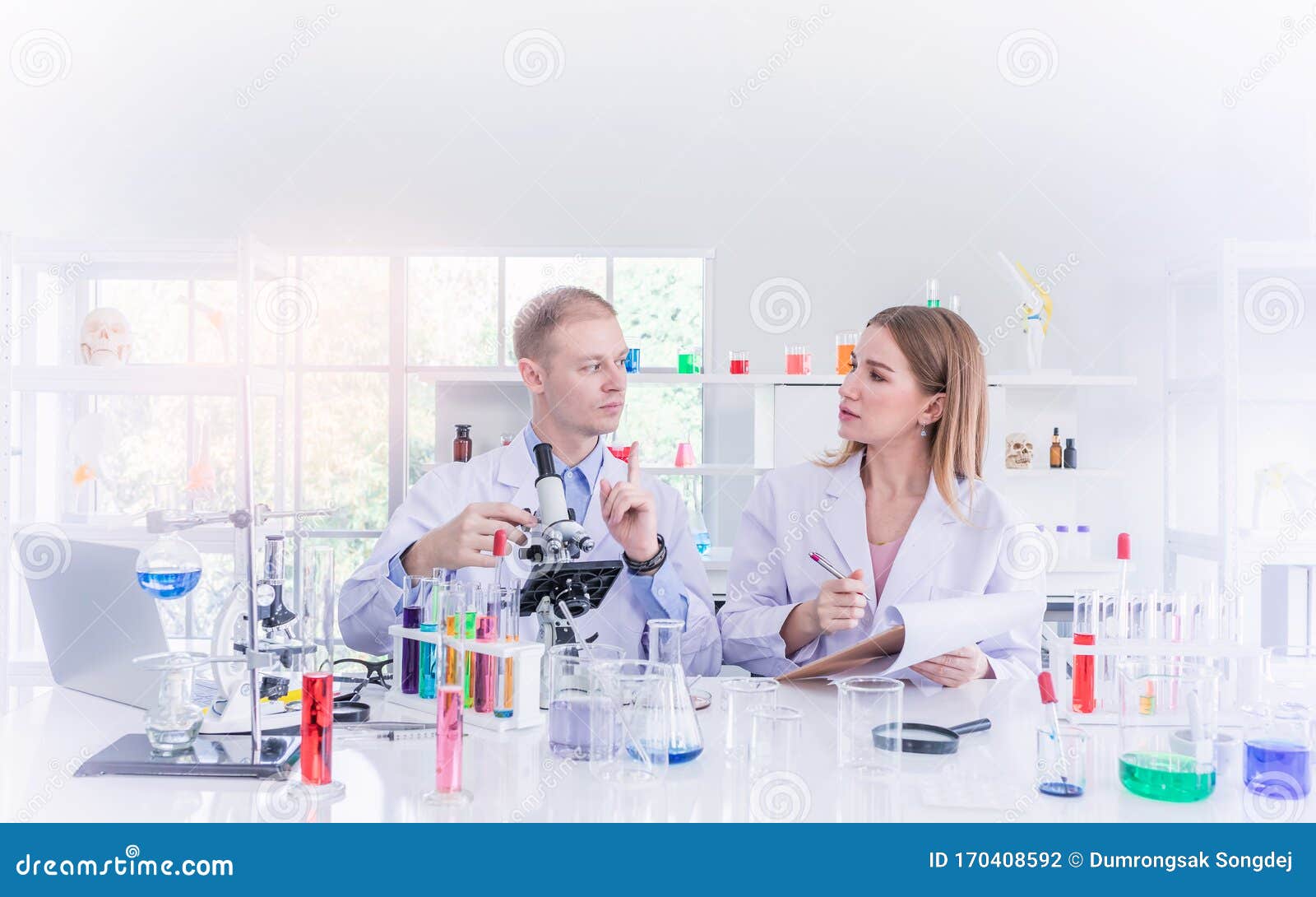 Two Scientists Working in Chemical Laboratory Stock Photo - Image of ...